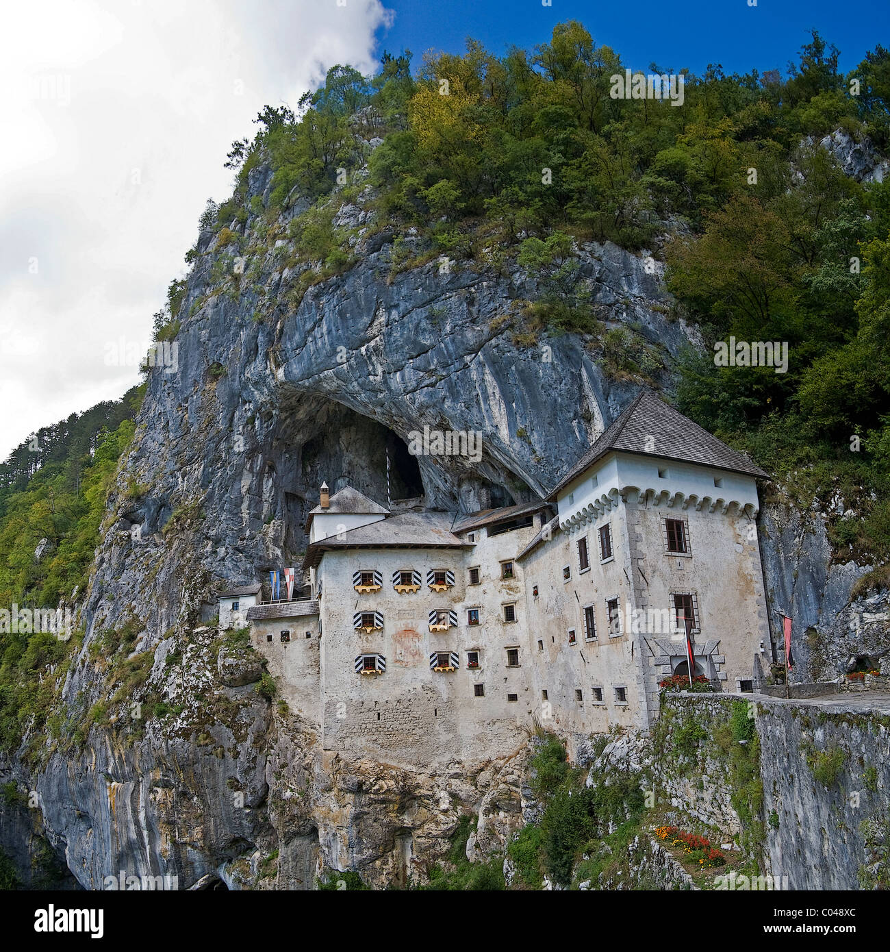 Predjamski Grad is an amazing castle built into the cliffs deep in the ...