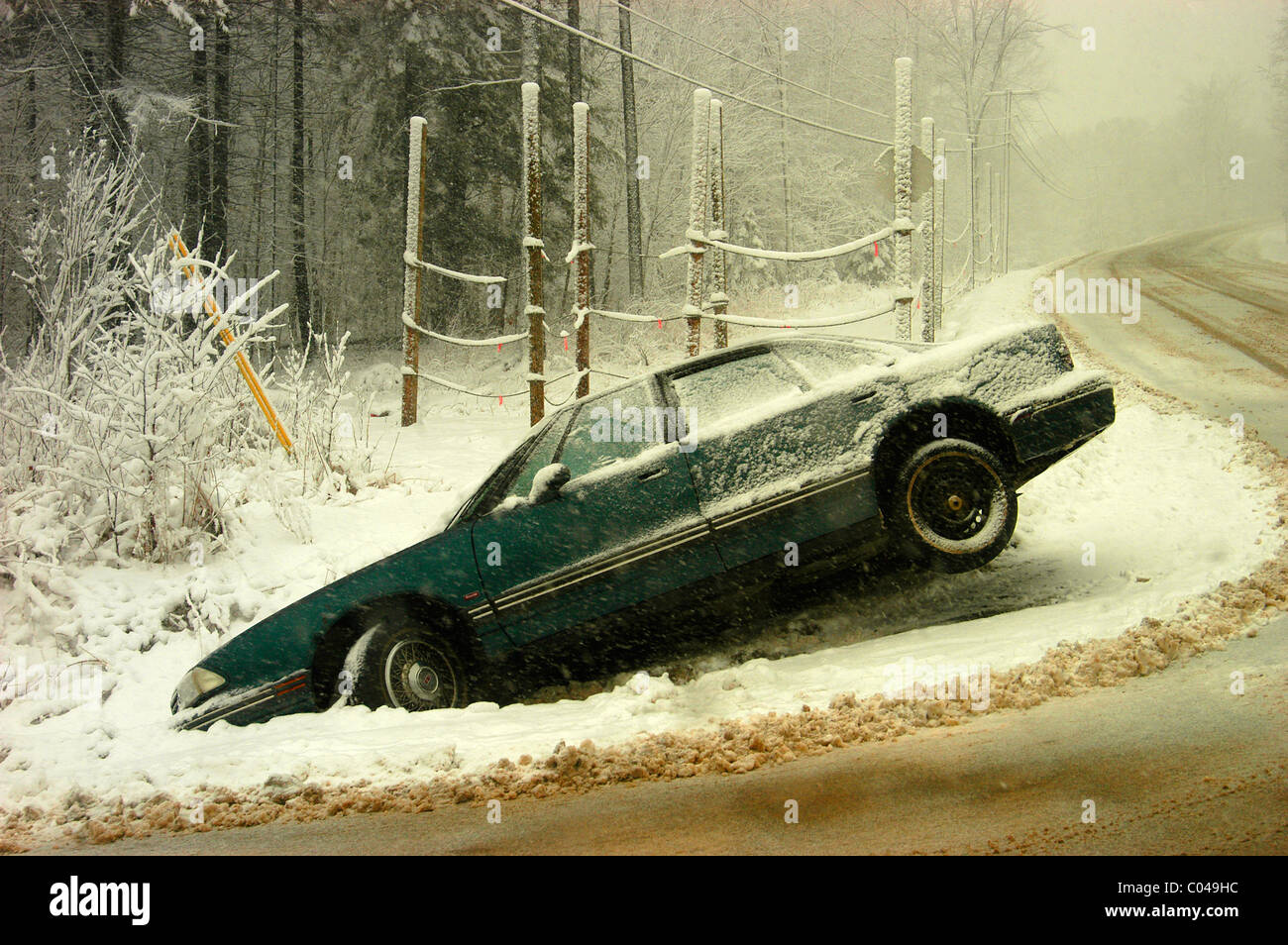 vehicle skidded off the road during a snow storm Stock Photo - Alamy
