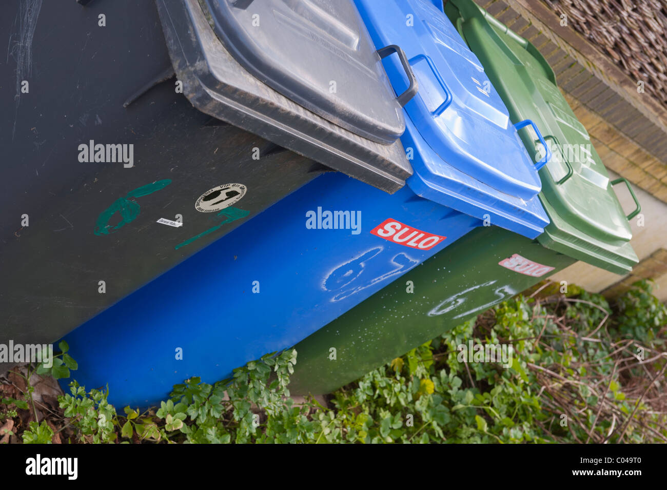 A row of three sulo wheely bins in the Uk Stock Photo - Alamy