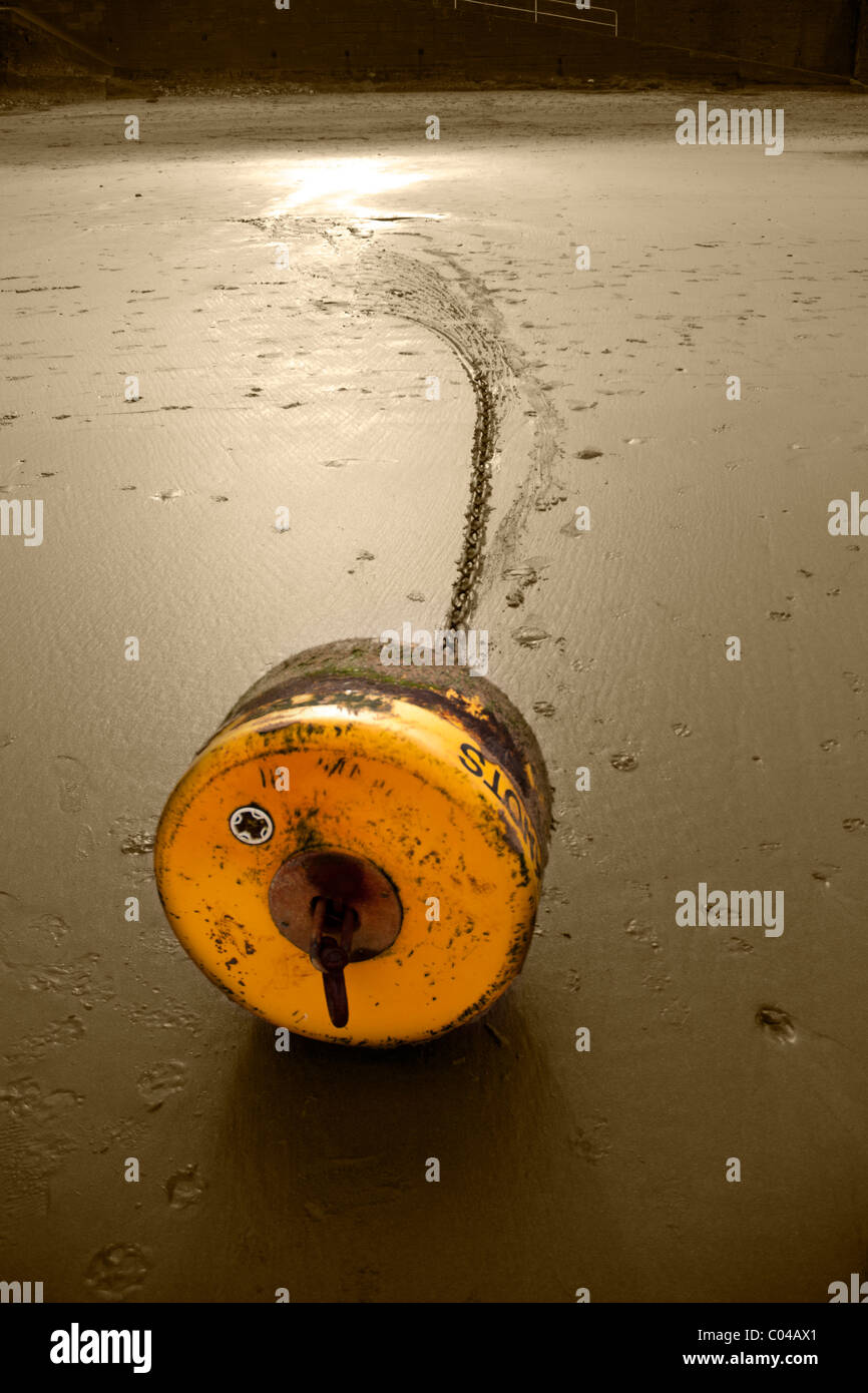 Whitby Beach washed up buoy Stock Photo - Alamy
