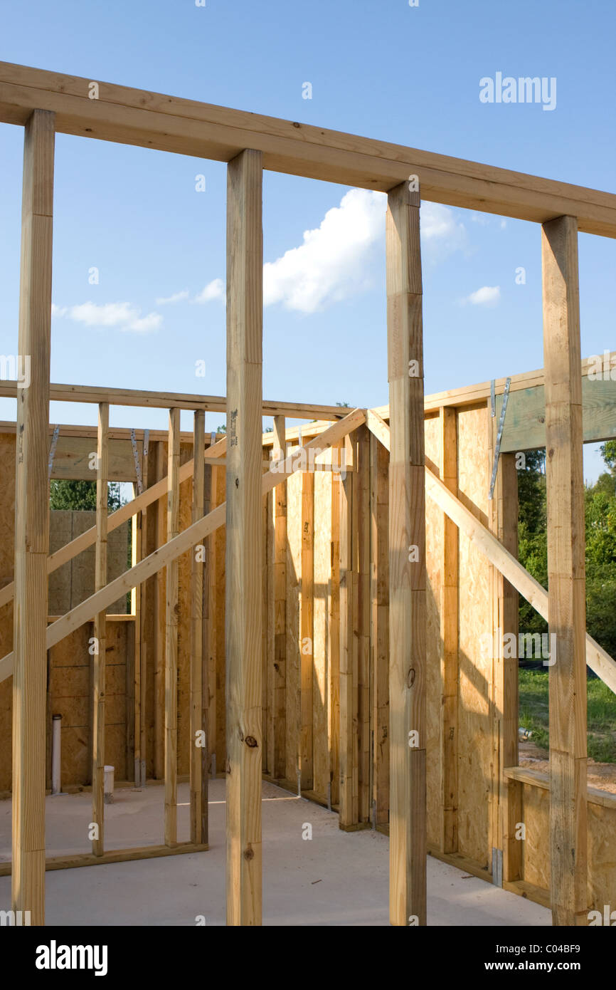 Stud wall construction for a new home built of wood with a concrete ...