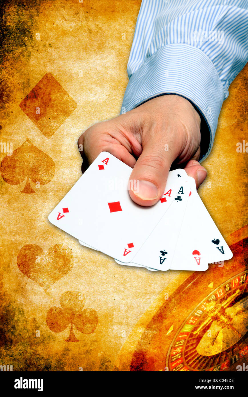 man hand showing four aces cards Stock Photo - Alamy