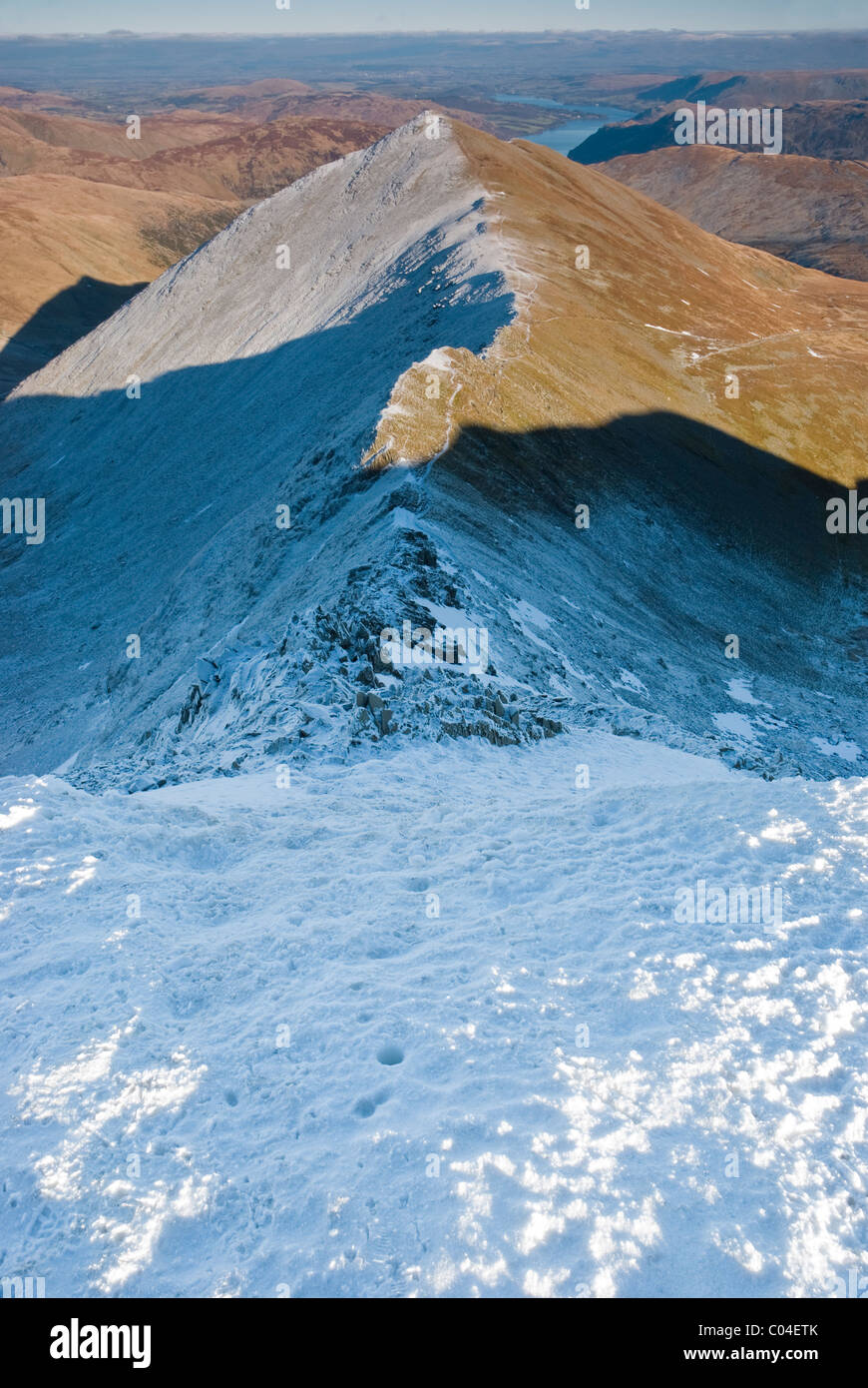 Striding edge winter walker snow hi-res stock photography and images ...