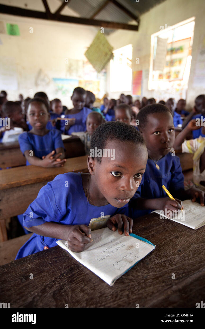 Ugandan girl in school uniform hi-res stock photography and images - Alamy