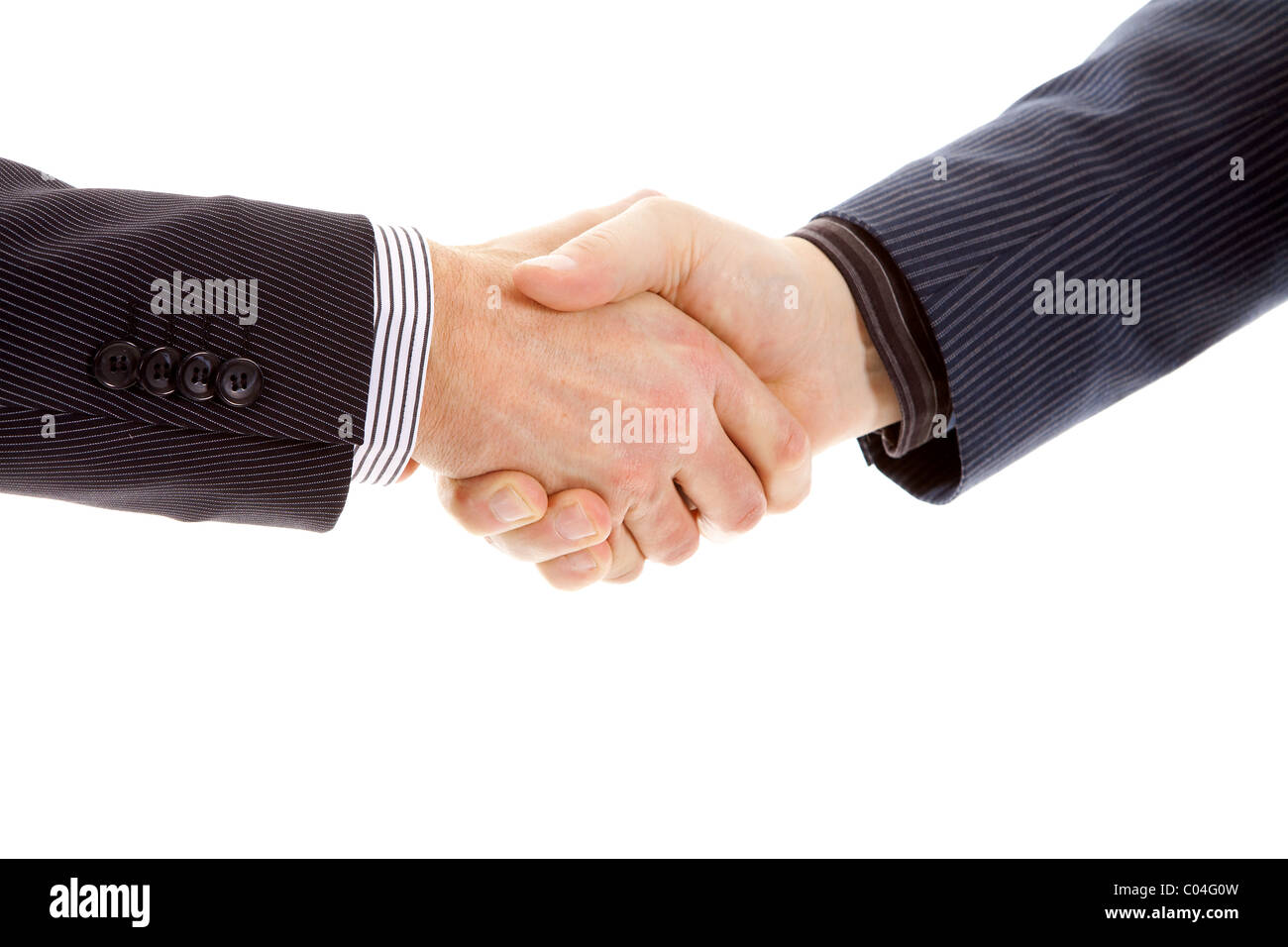 Business man making handshake in closeup over white background Stock ...