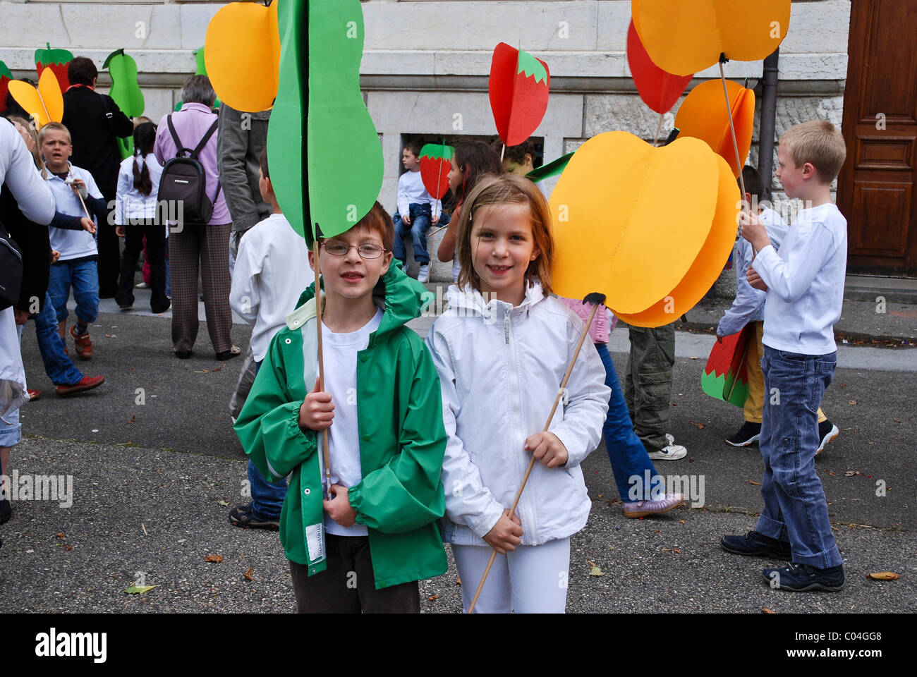 Children carrying signs playing, parade, smiling, posing. Charles ...