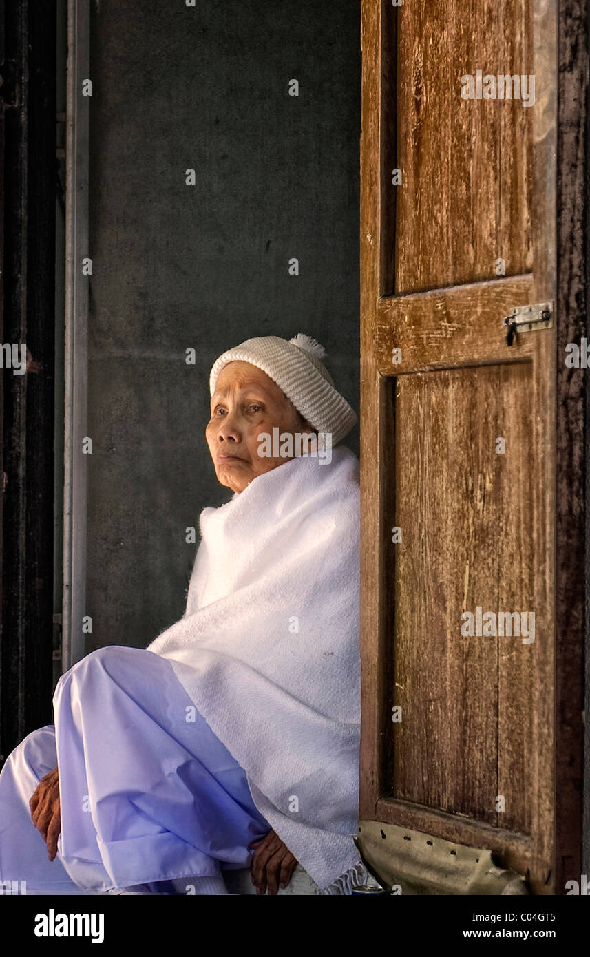 old mature female Buddhist monk in the hills of Thailand Stock Photo ...