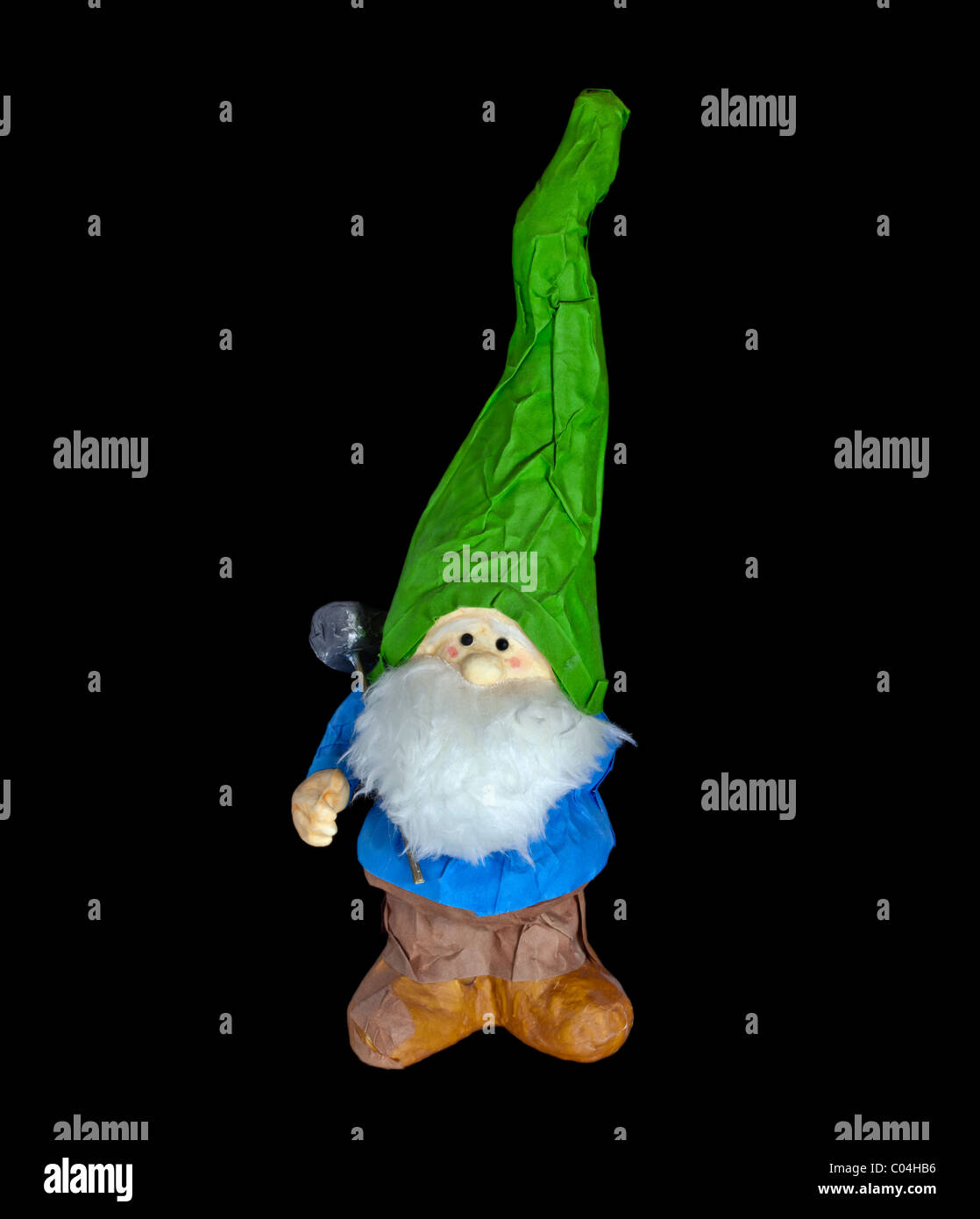 Paper mache garden gnome isolated on black background. Studio Lupica ...
