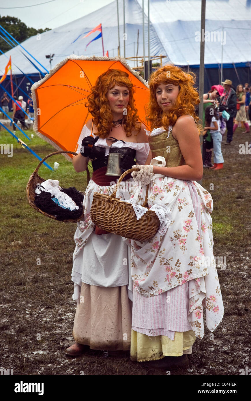 Two young girls dressed up for Glastonbury Festival, Somerset, UK Stock ...