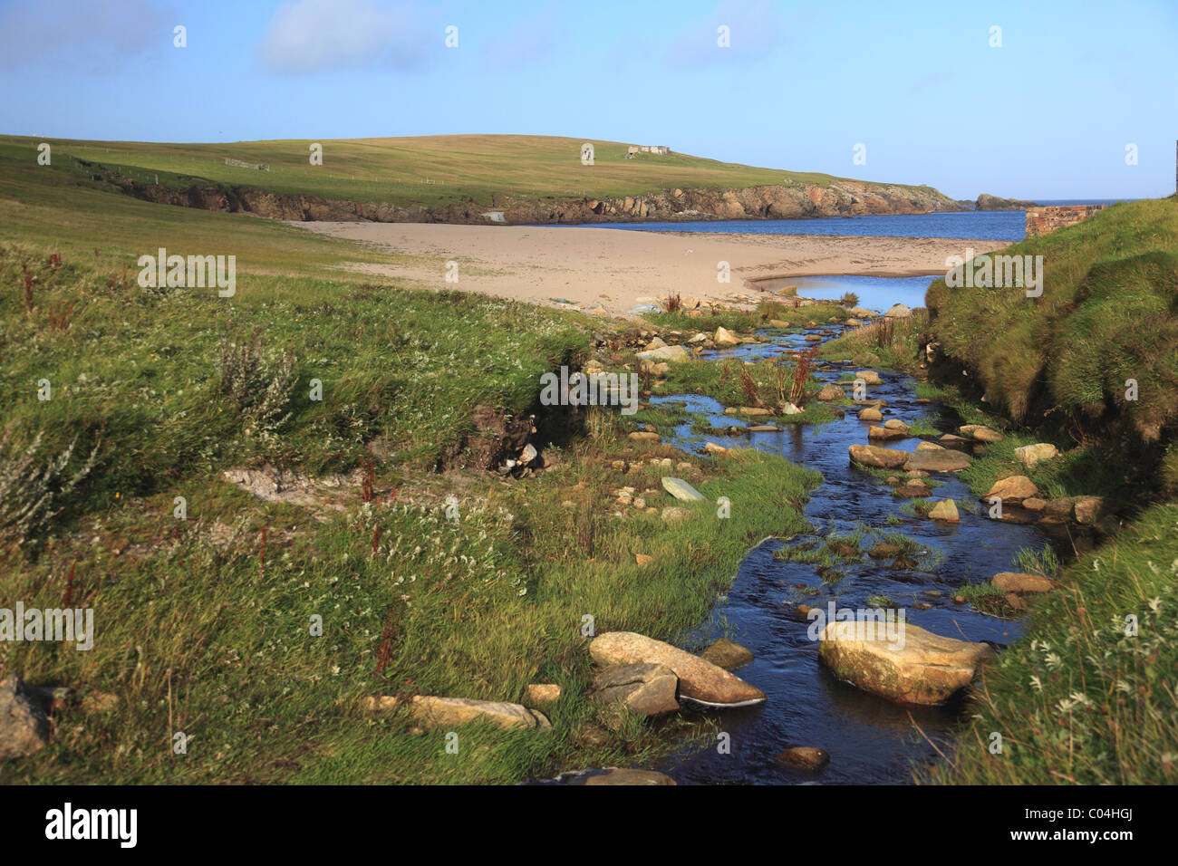 The Burn of Skaw flowing into the Wick of Skaw and Skaw beach, the most ...