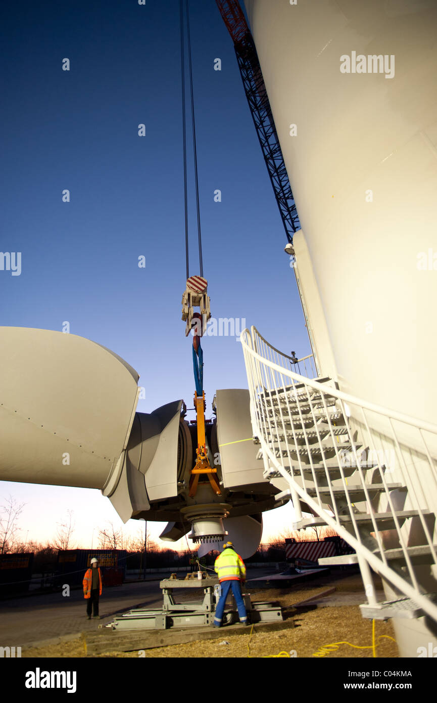 Preparing to lift Wind Turbine Blades into position at Dawn Stock Photo ...