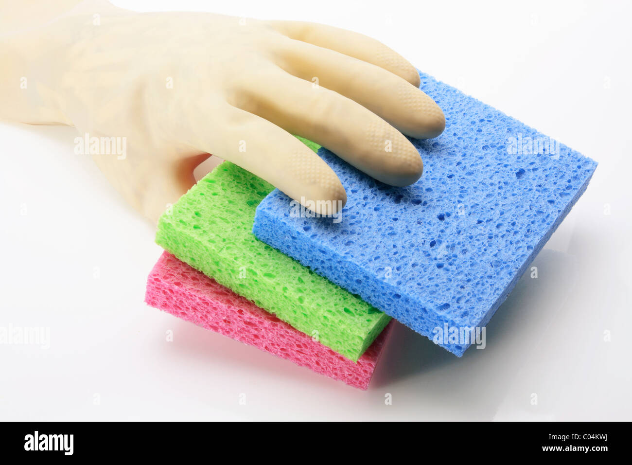 Hand in Rubber Glove and Sponges Stock Photo - Alamy