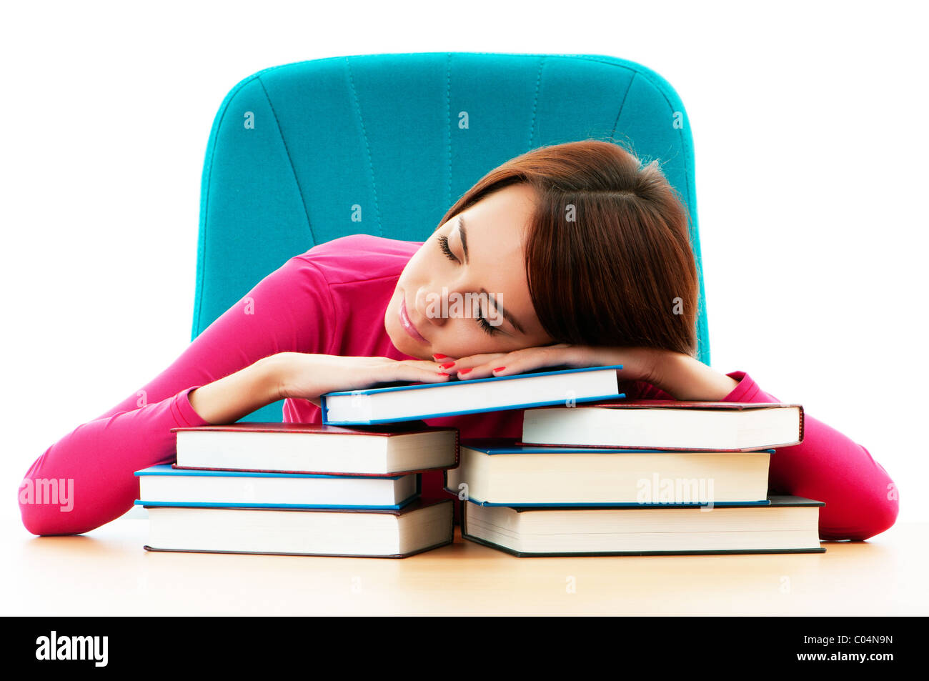 Young female student with many study books Stock Photo - Alamy