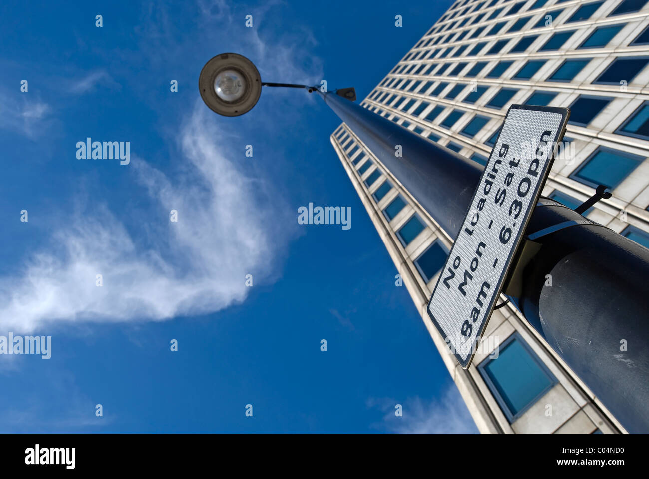 no loading sign with times and days of operation outside an office ...