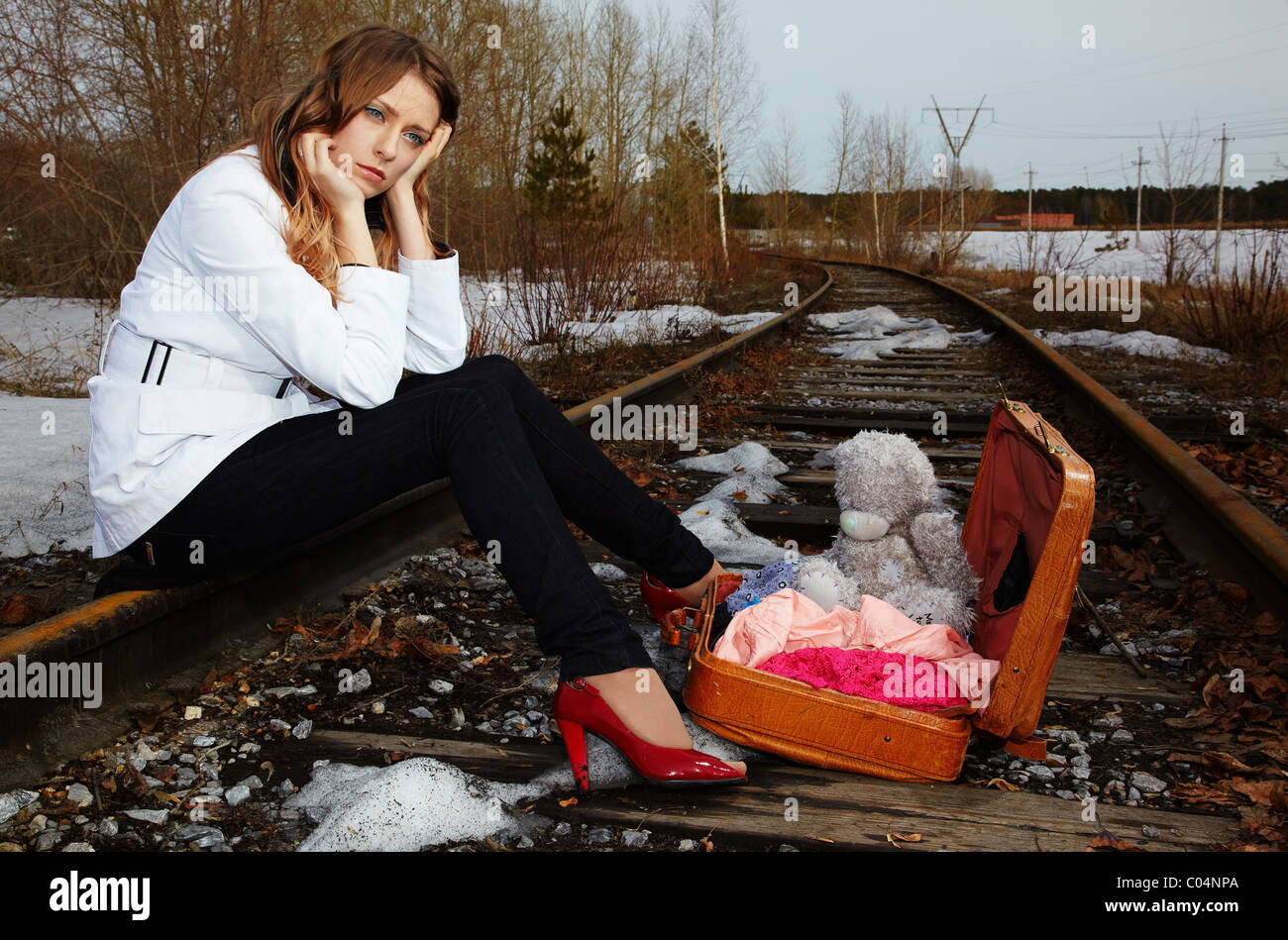 Girl on rail Stock Photo - Alamy