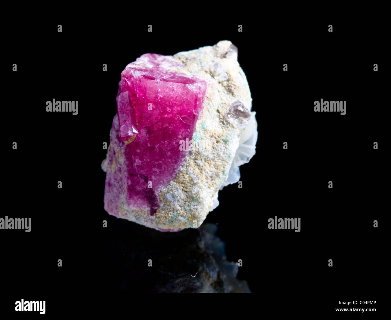 Red beryl crystal on matrix Stock Photo - Alamy