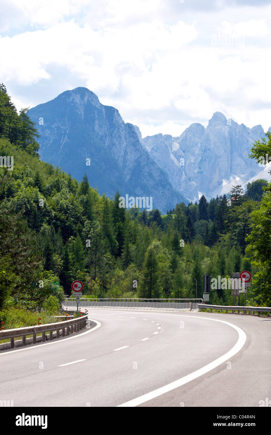 highway in Austrian Alps. vertical shot. another similar shots ...