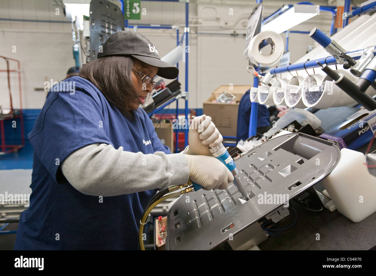 Workers Assemble Charging Stations for Electric Cars Stock Photo - Alamy