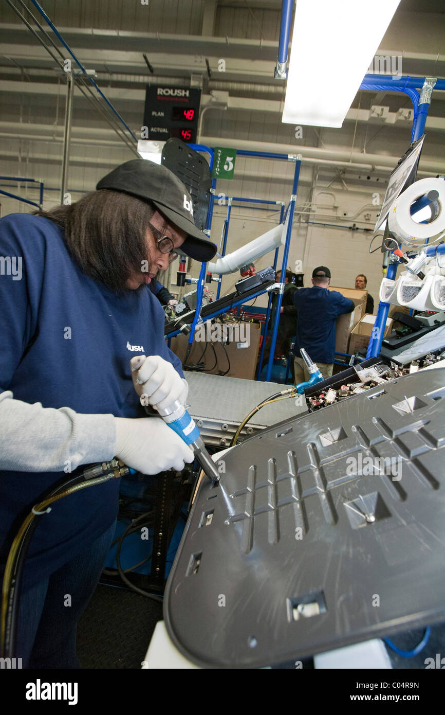 Workers Assemble Charging Stations for Electric Cars Stock Photo - Alamy