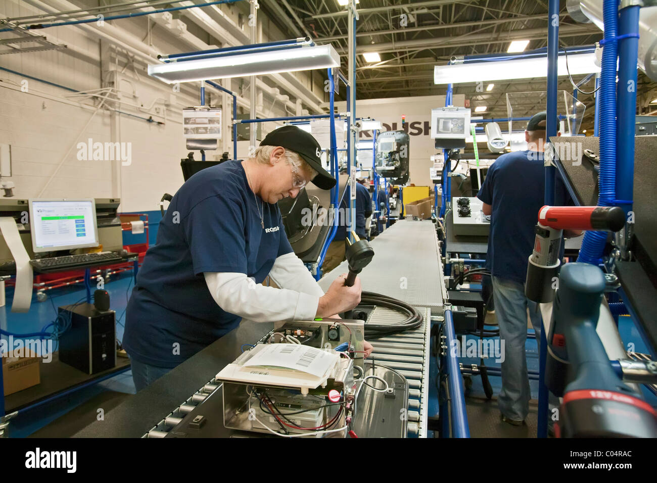 Workers Assemble Charging Stations for Electric Cars Stock Photo - Alamy