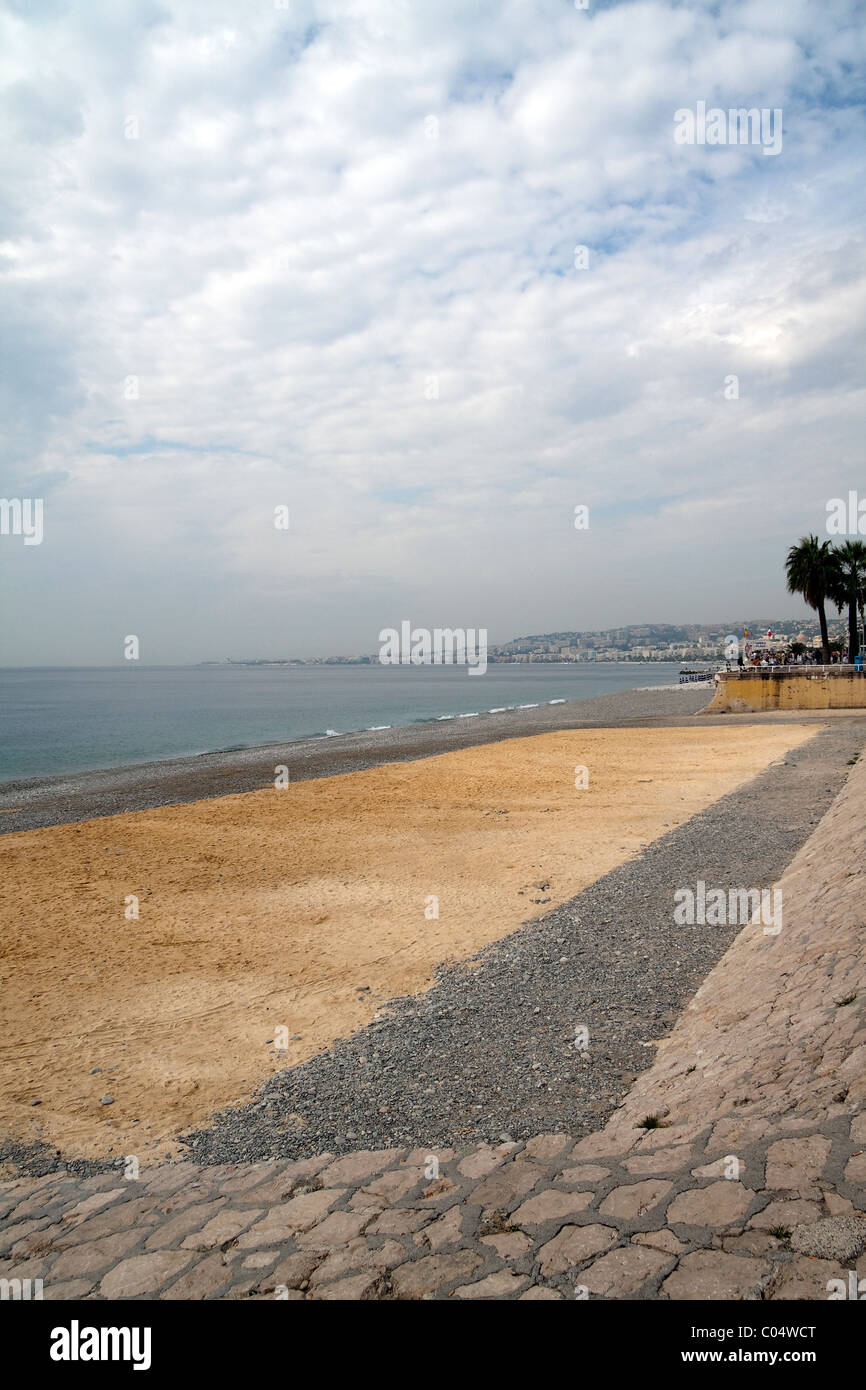 The sandy and rocky beach in Nice, France Stock Photo - Alamy