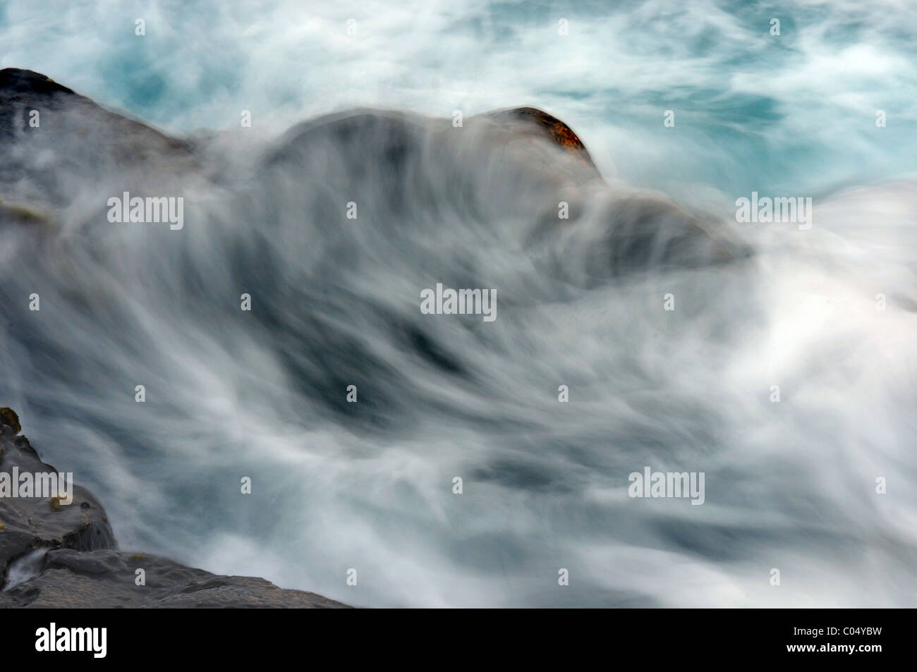 Water washing over rocks hi-res stock photography and images - Alamy