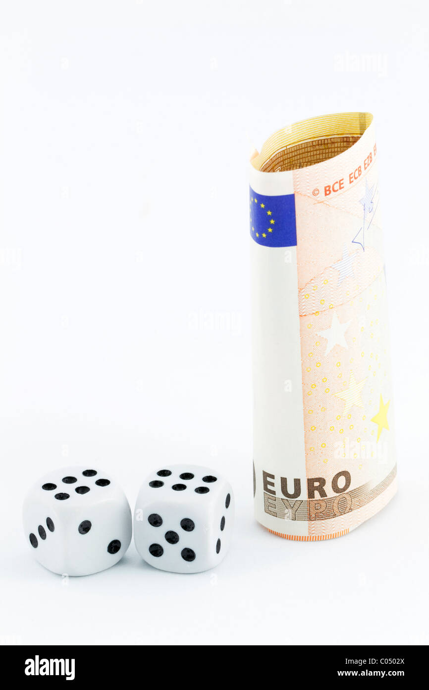 Euro currency and dice with a white background reflects instability and ...