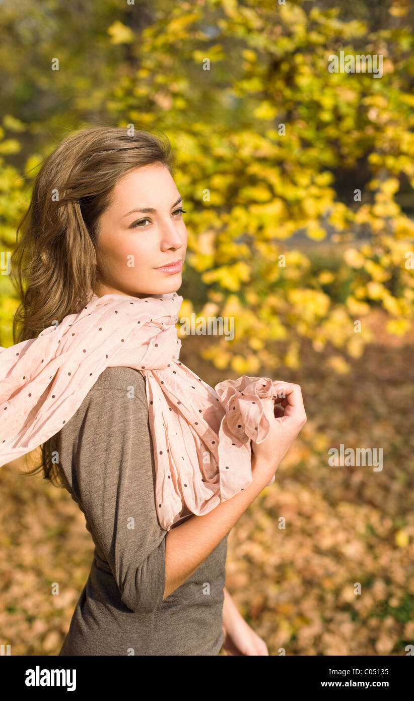 Beautiful autumn brunette Stock Photo - Alamy