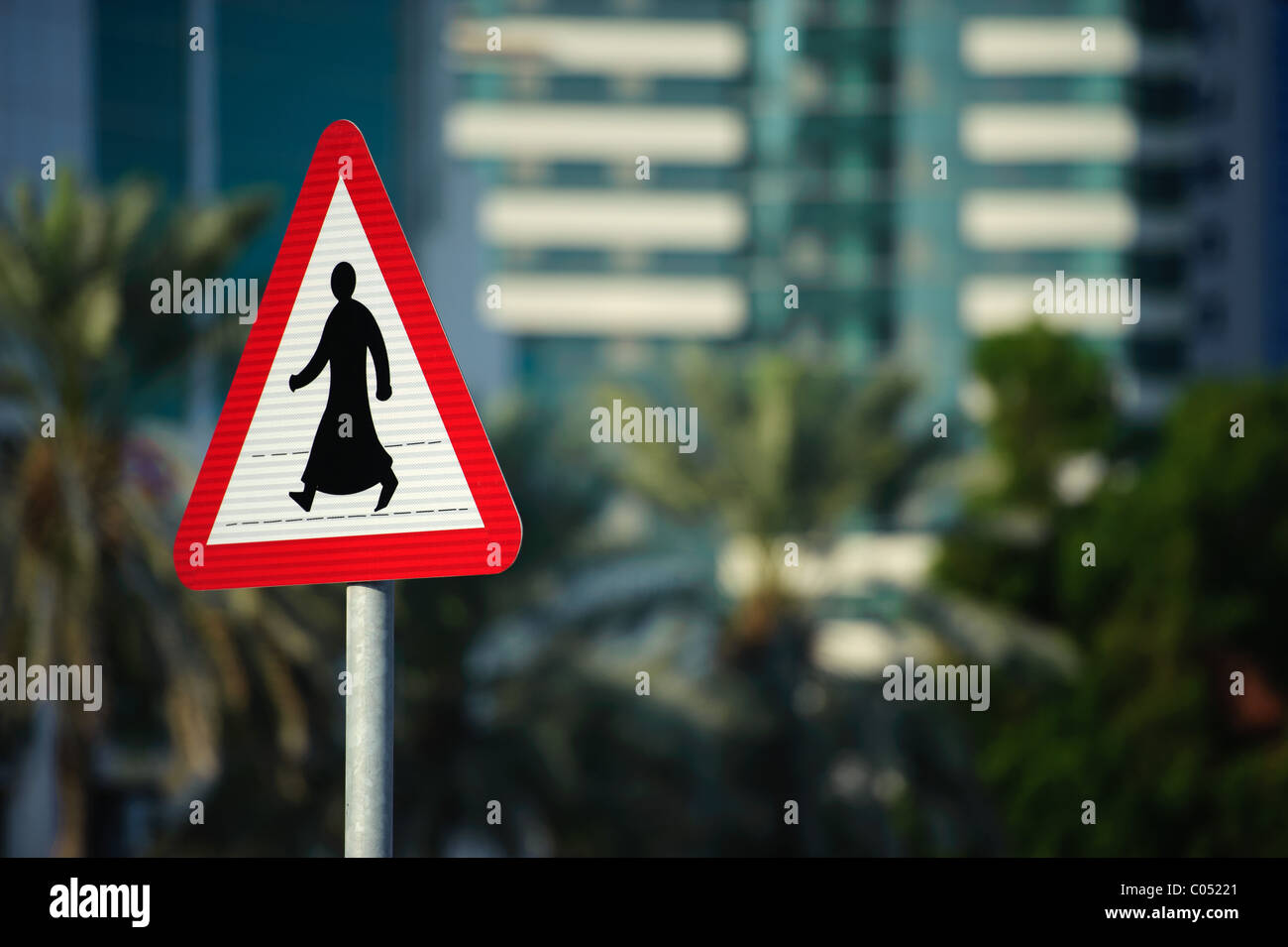 Pedestrian Crossing Sign on Al Corniche Street, Doha, Qatar showing a ...