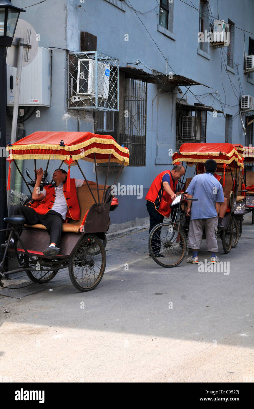 Beijing China Hutong rickshaw rides tourist tourists Stock Photo - Alamy