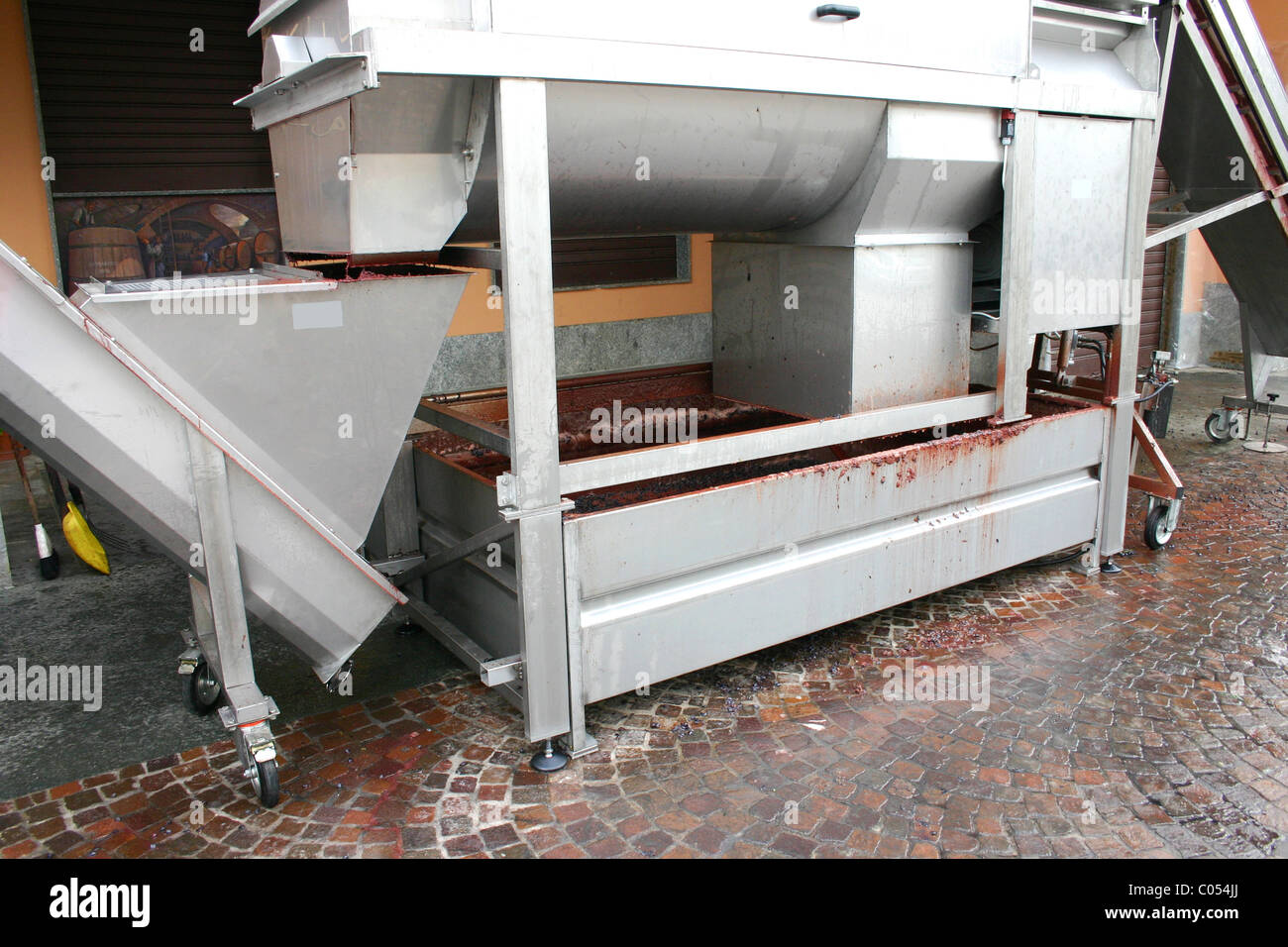 Wine making grape pressing machine hi-res stock photography and images ...