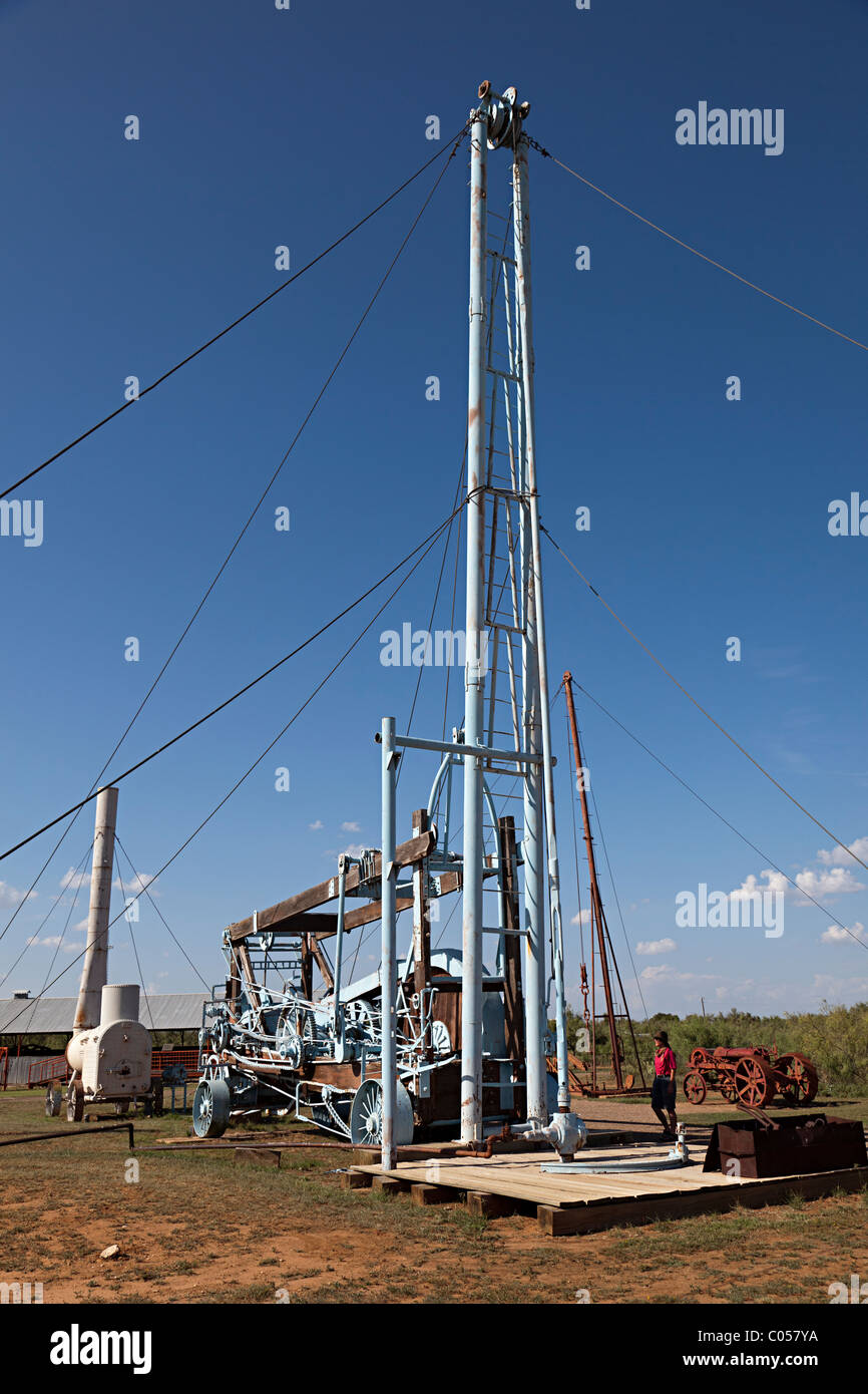Person standing beside Star Spudder 45C drilling machine Permian Basin ...