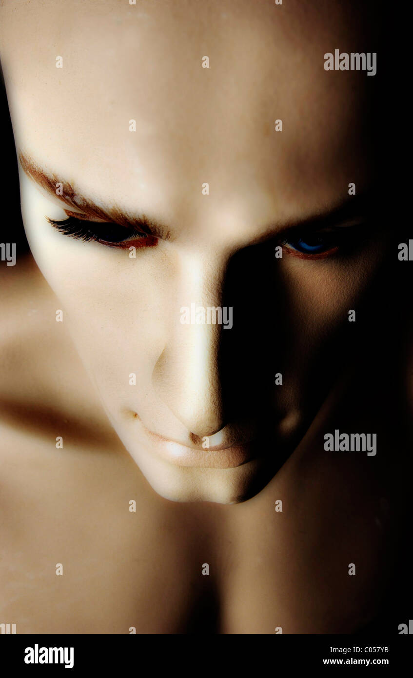 Close up of the face of a male mannequin looking down Stock Photo - Alamy