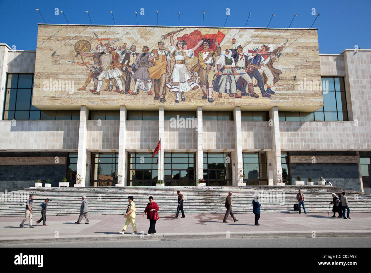 A daily life street scene with people in front of the National ...