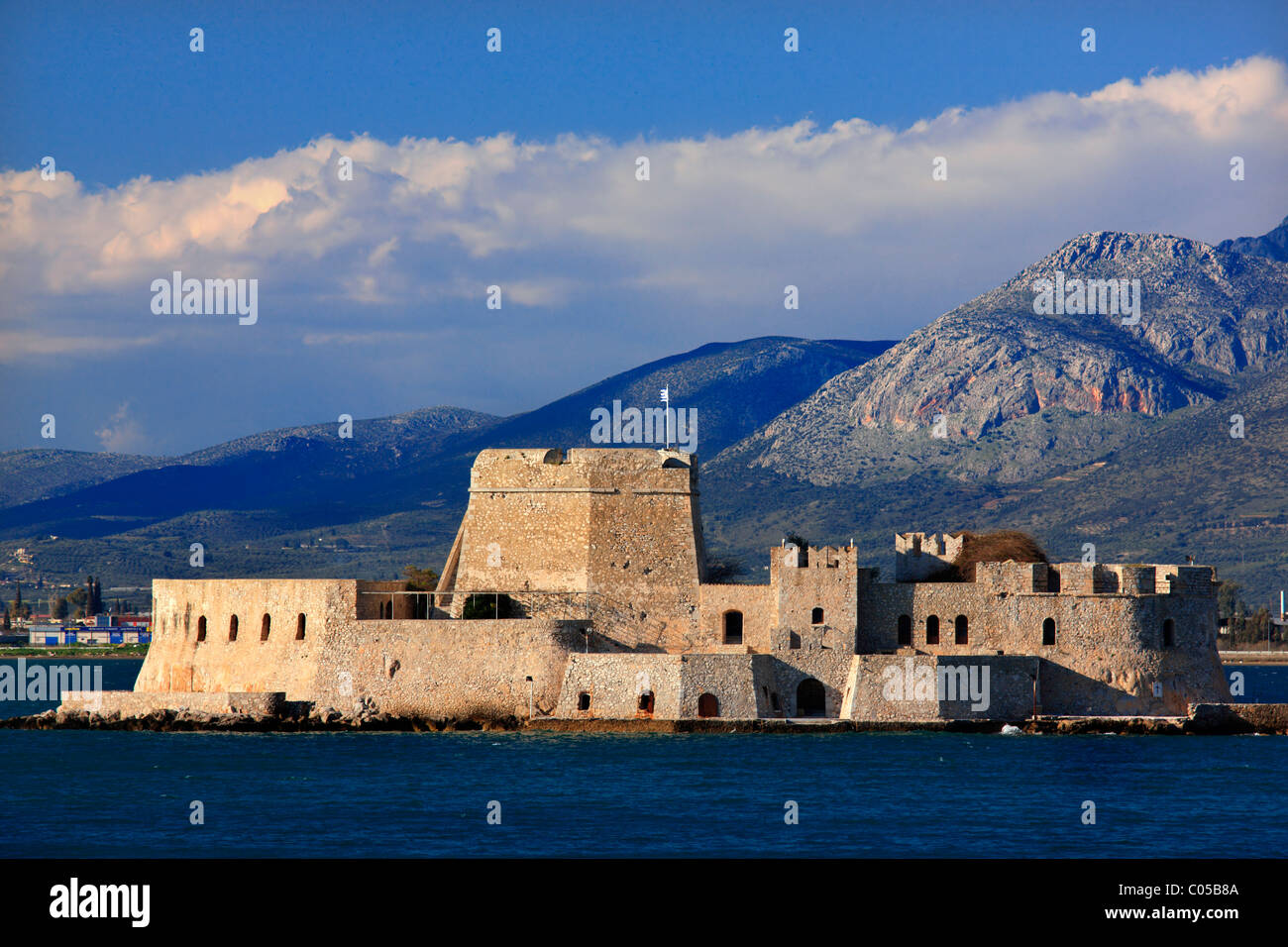 The Castle of Bourtzi, located on a tiny island on the entrance of the ...