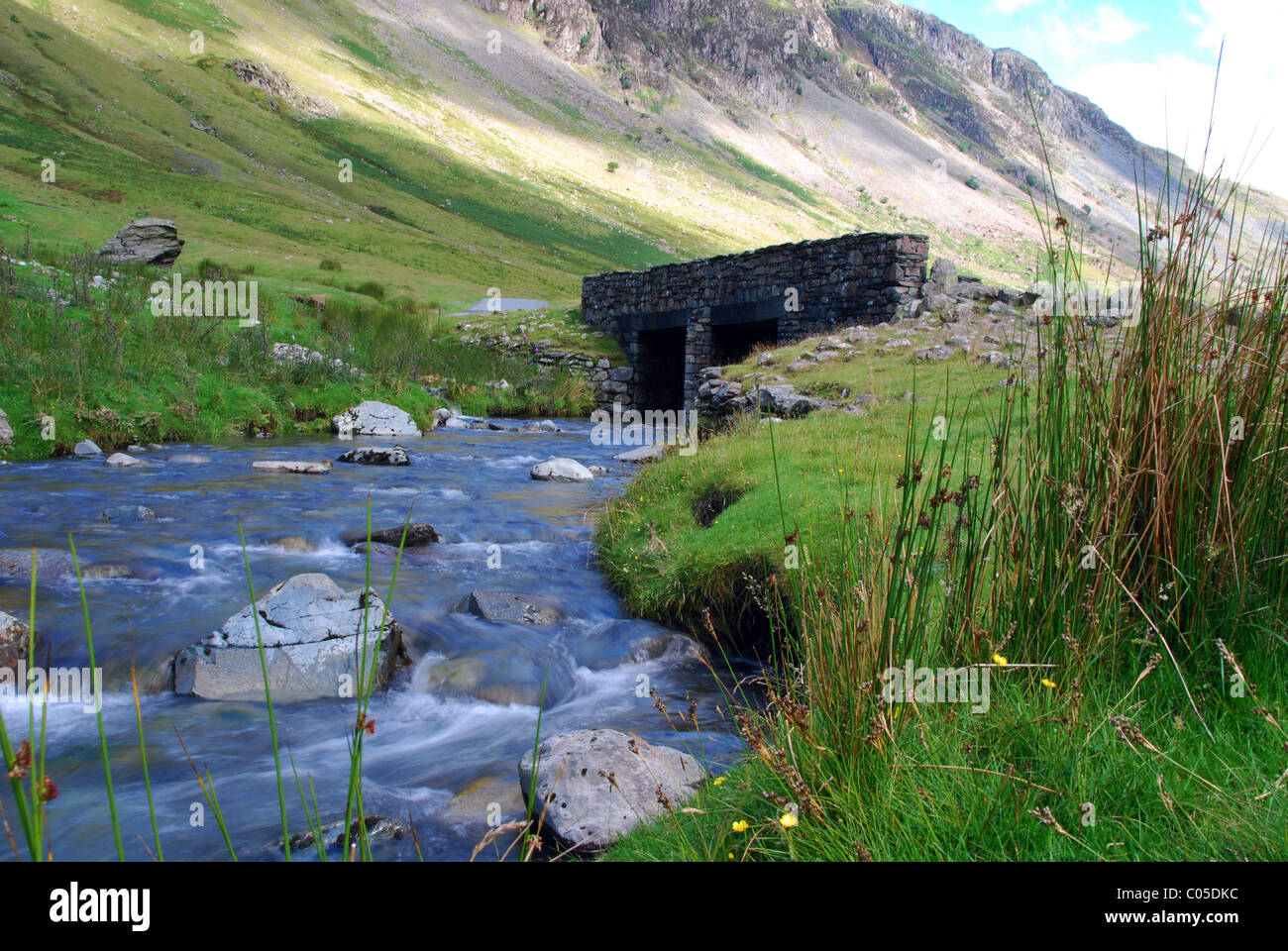 Bridge over stream at Honister Pass, Lake District Stock Photo - Alamy