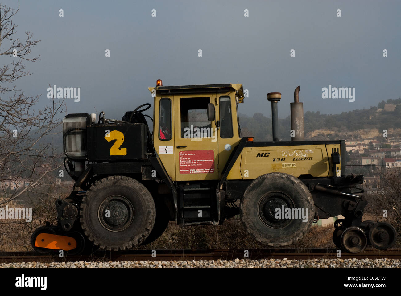 Train track and edge cleaning machine working up and down the track ...