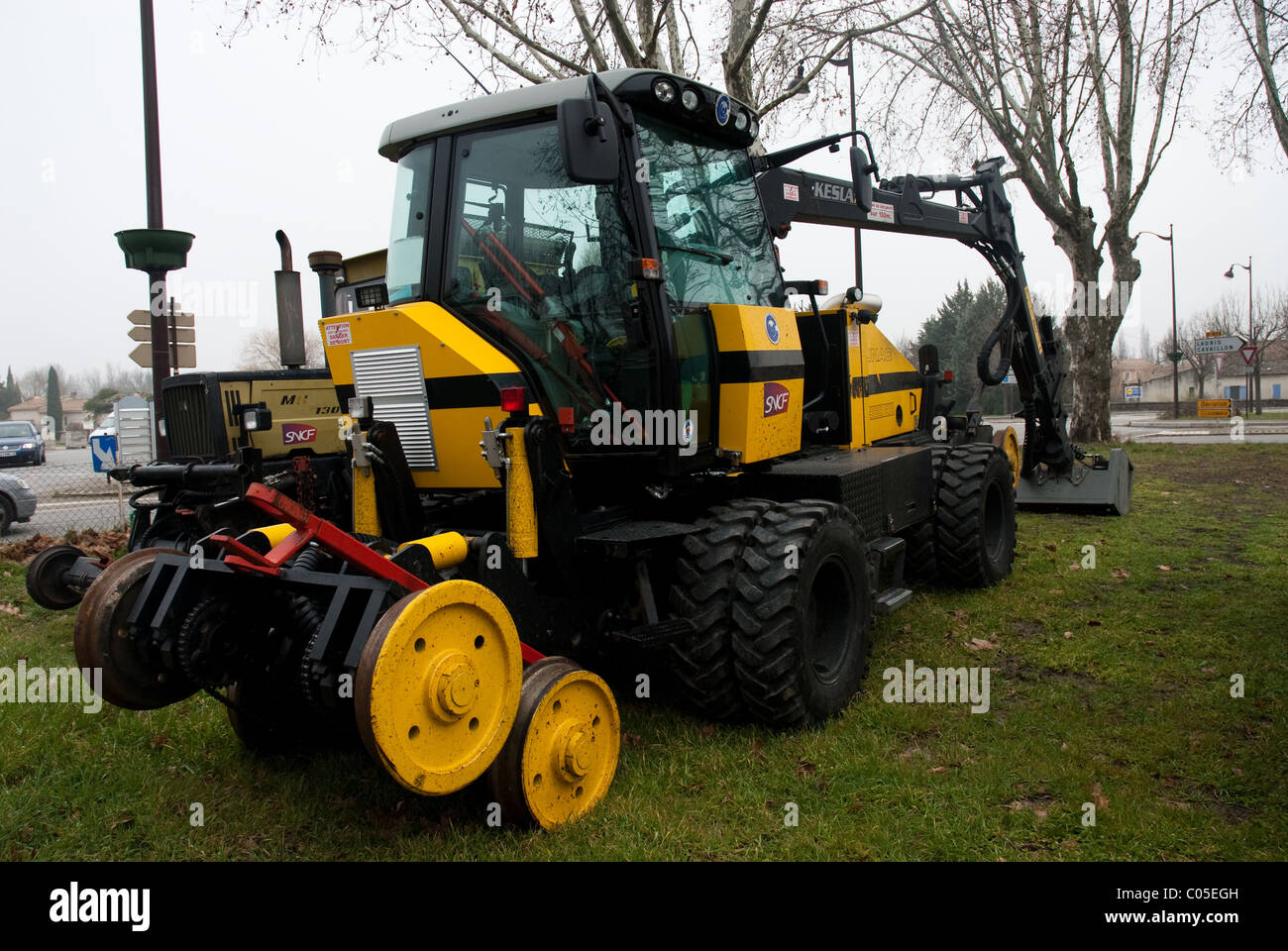 Train track repair and work machine Stock Photo - Alamy