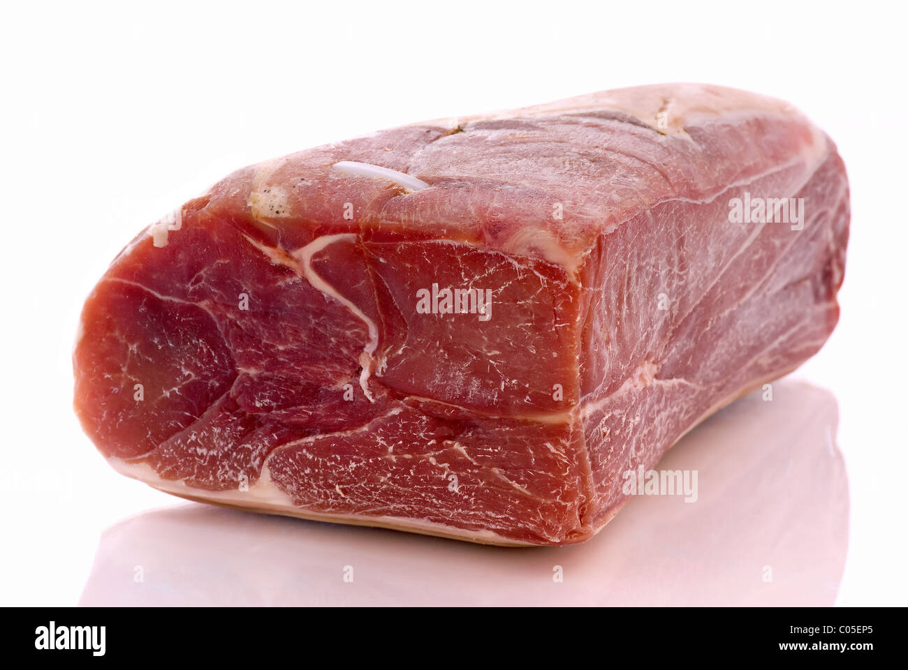 Piece of Ham isolated Stock Photo - Alamy