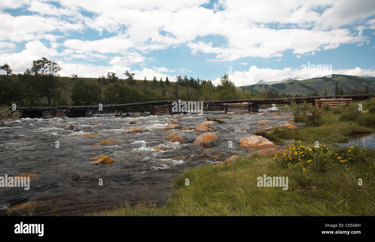 Wooden bridge over river Stock Photo - Alamy