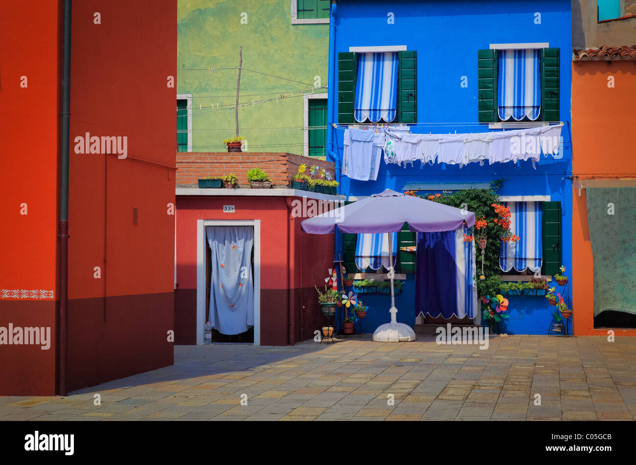 Colorful homes in Burano, an island in the Venetian Lagoon Stock Photo ...