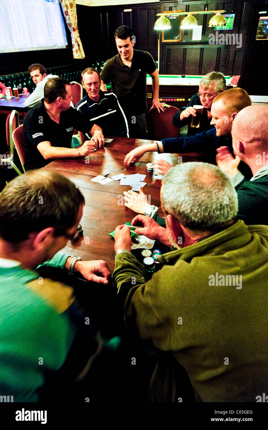 A group of men in an English pub playing cards Stock Photo - Alamy