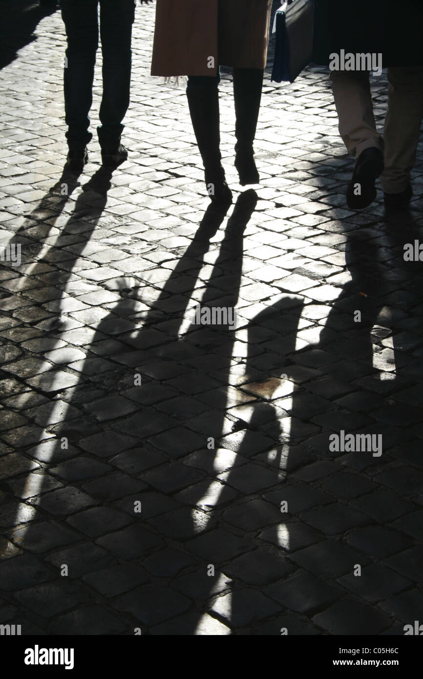 business man woman commuter commuters feet legs walking in street in ...