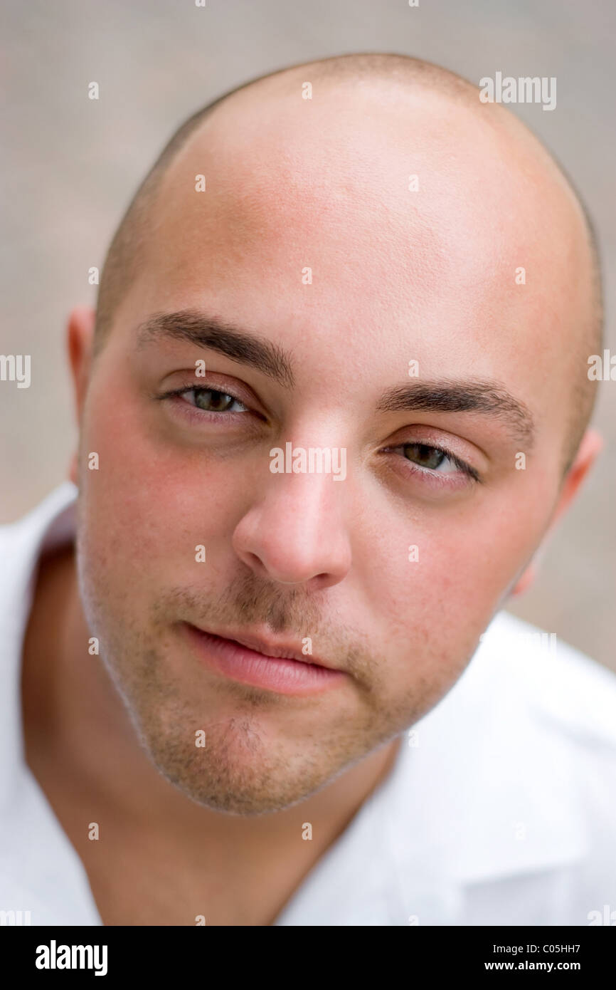 A young man with a sincere look on his face Stock Photo - Alamy