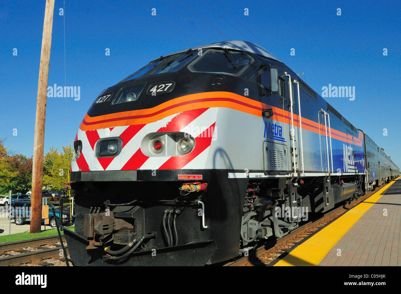 A eastbound Metra commuter train departs the station heading for ...
