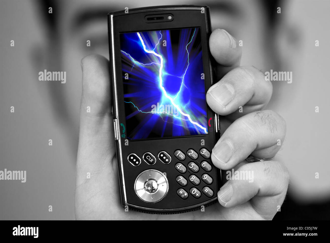 Hand holding lightning bolt hi-res stock photography and images - Alamy