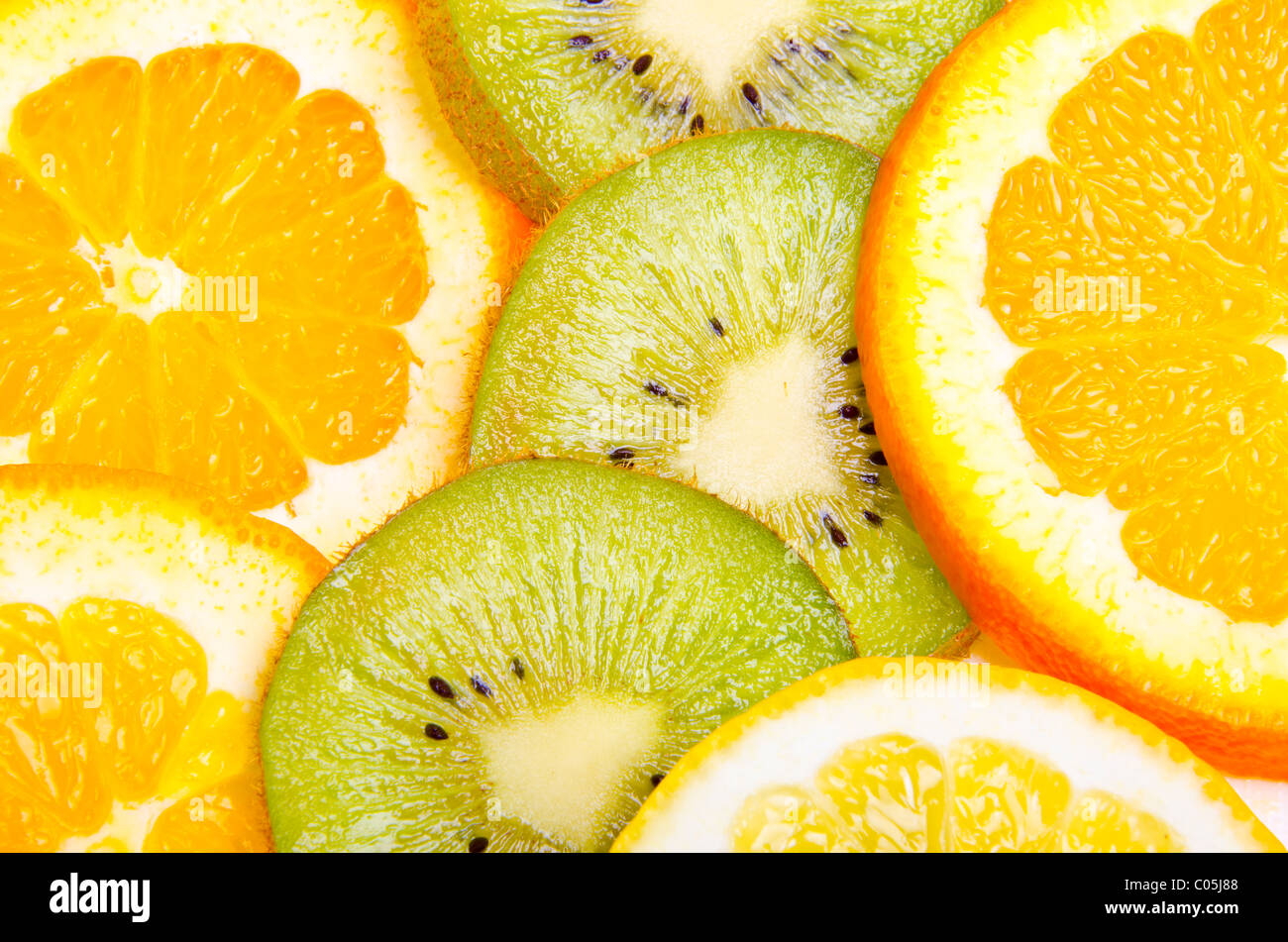 Mixed Sliced Fruits; Lemon, Kiwi and Orange Stock Photo - Alamy