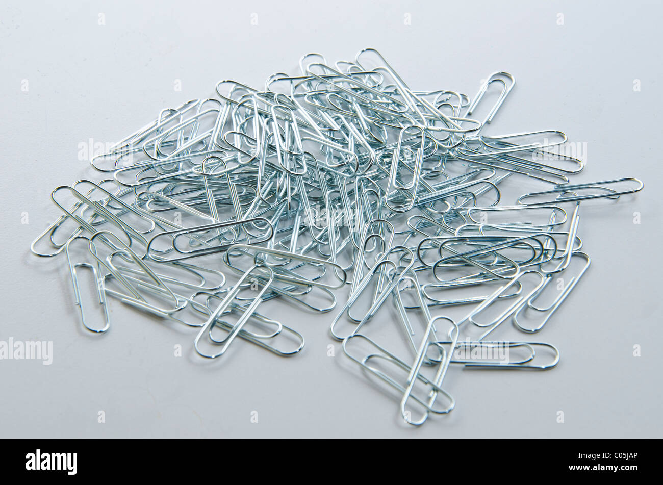 Lots of Paper Clips Spread Randomly Stock Photo - Alamy