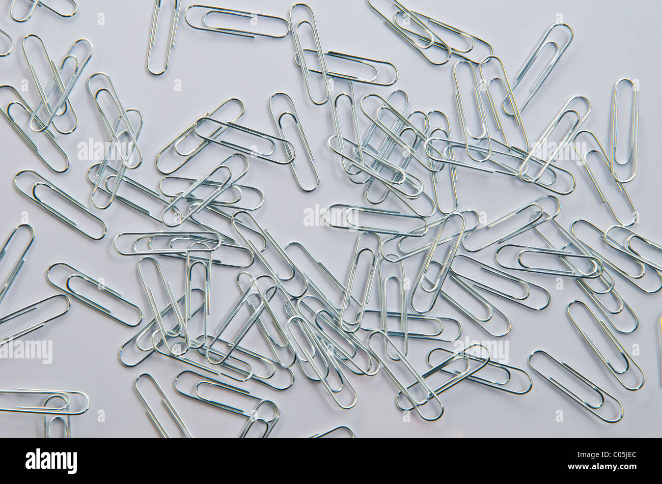 Lots of Paper Clips Spread Randomly Stock Photo - Alamy