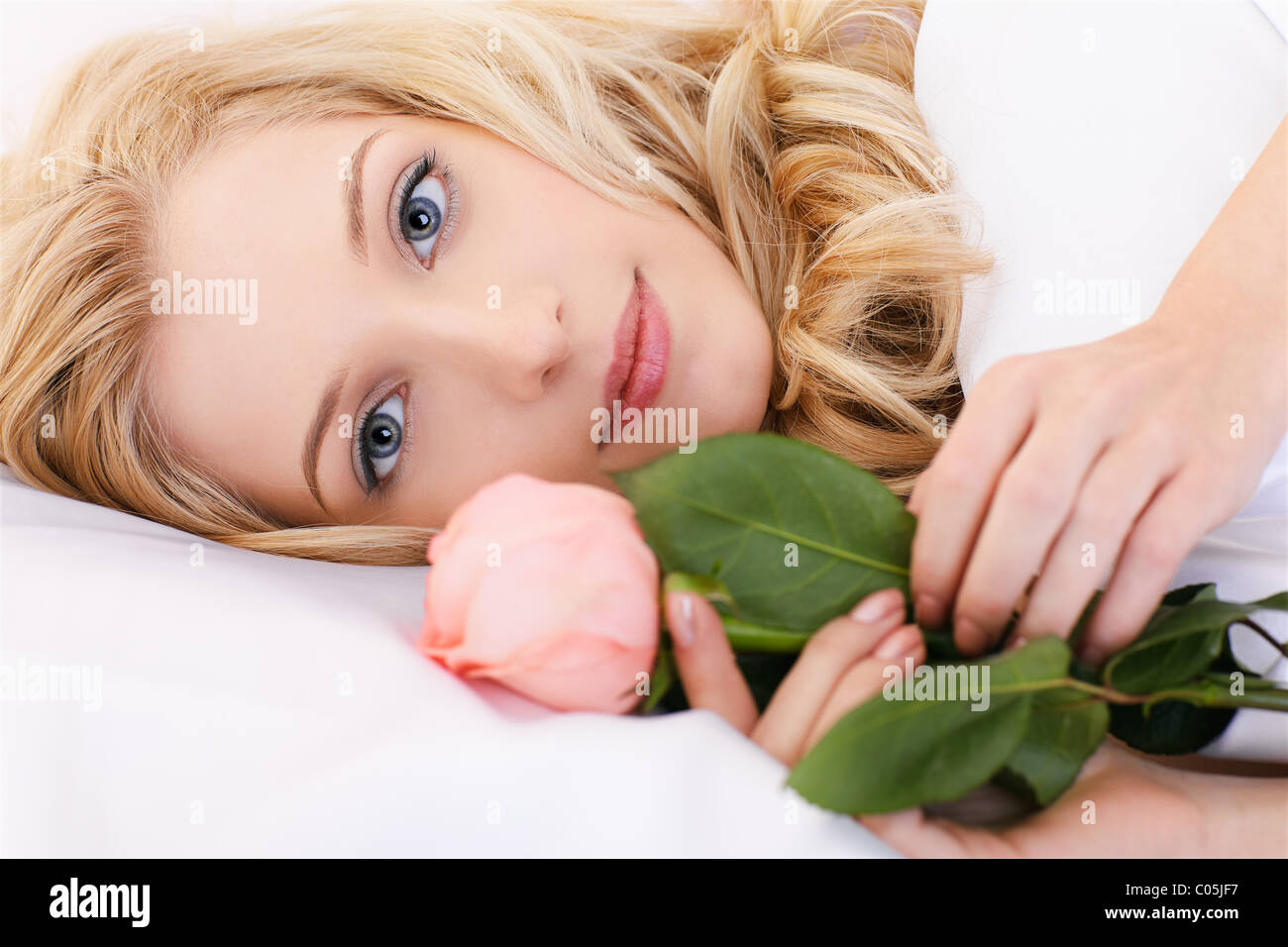 beautiful girl with rose Stock Photo - Alamy